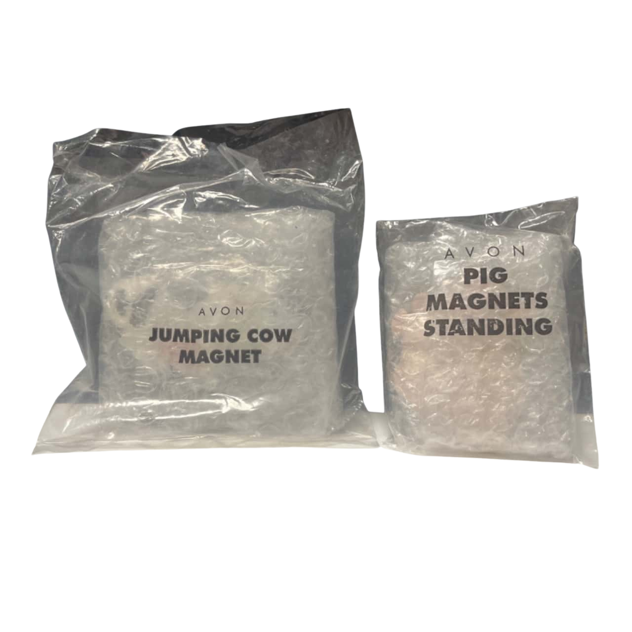 Avon set of two magnets- jumping cow magnets and pig standing magnets