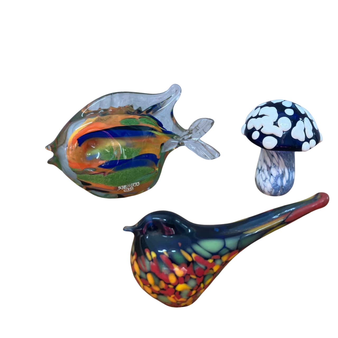 Beautiful glass pieces, a bird, a fish and a mushroom.(s)