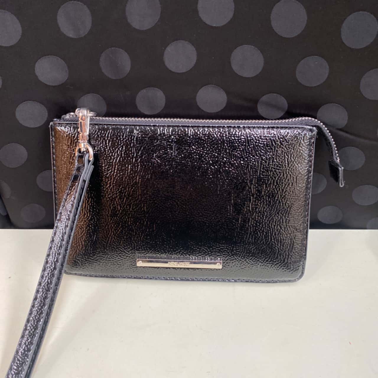 Nine West black pouch (s)