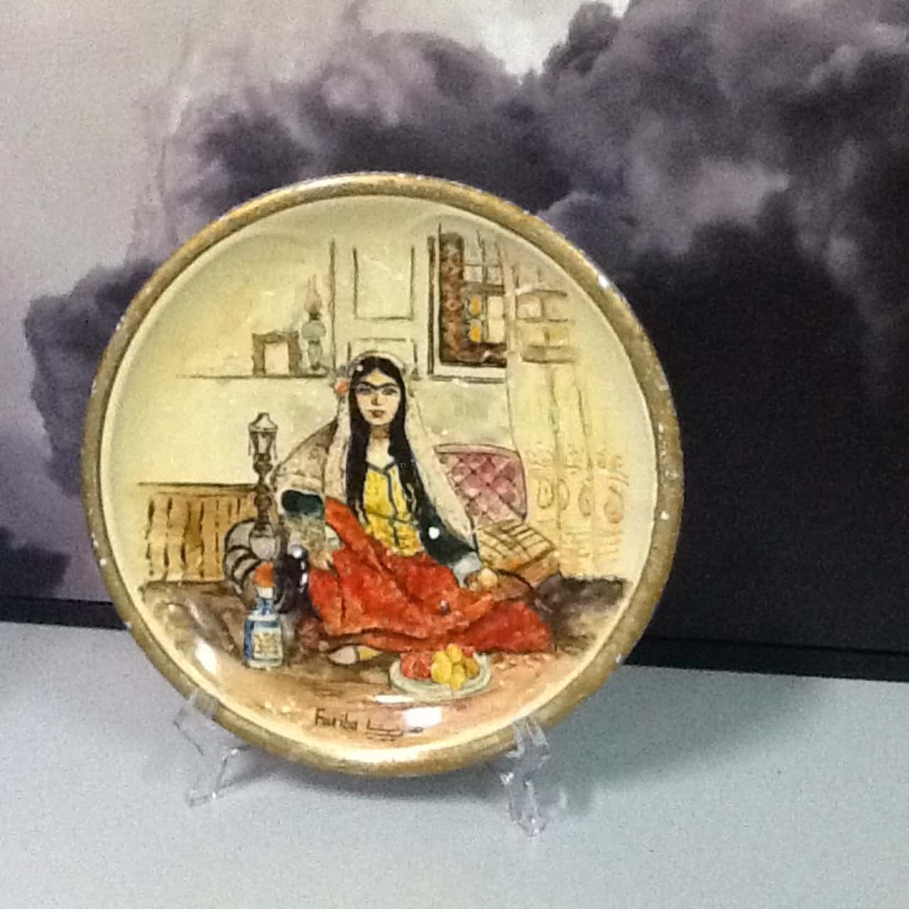 Decorative plate lovely colours seated woman painted in italy (s)