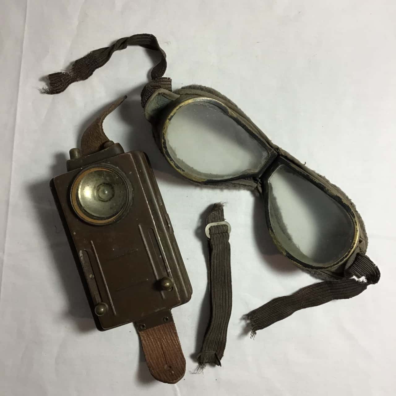 World War Goggles and Signal Lamp Memorabilia