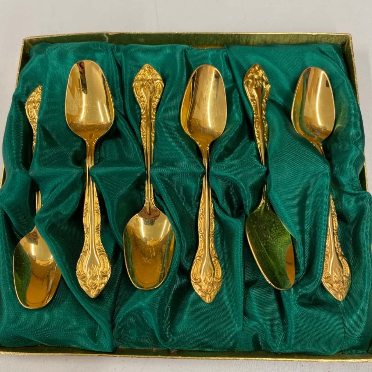 6 gold plated tea spoons