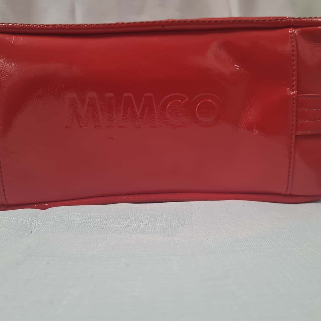 As new Mimco red patent leather handbag(s)