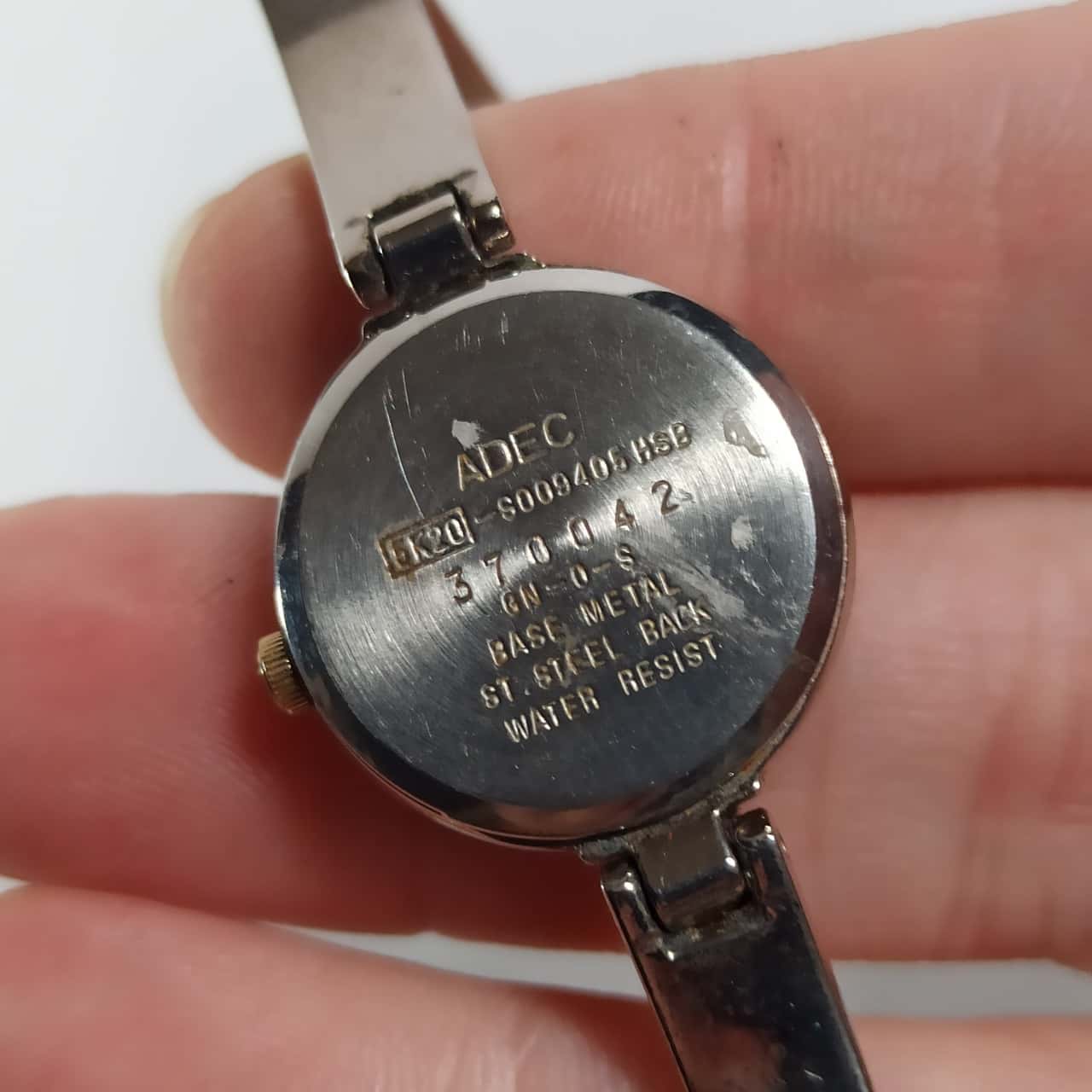 Citizen/Adec Womens Small Silver Round face watch with bling. Metal band