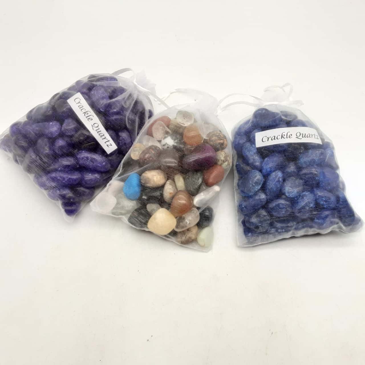 Three Bags of Crackled Quartz Stones and Other