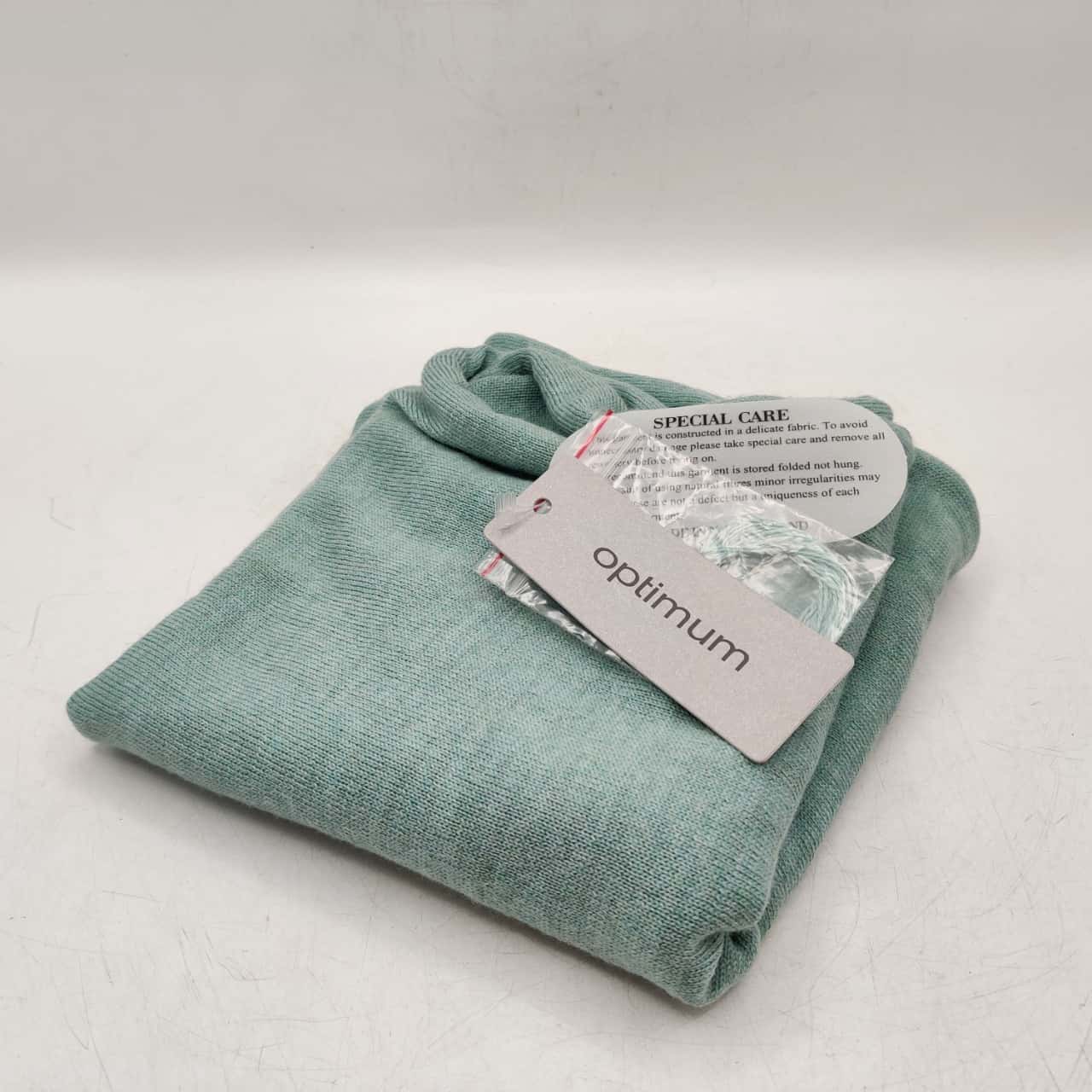 BNWT. Optimum. Unisex seafoam Green , pure merino wool, neck cowl. Sooo ...