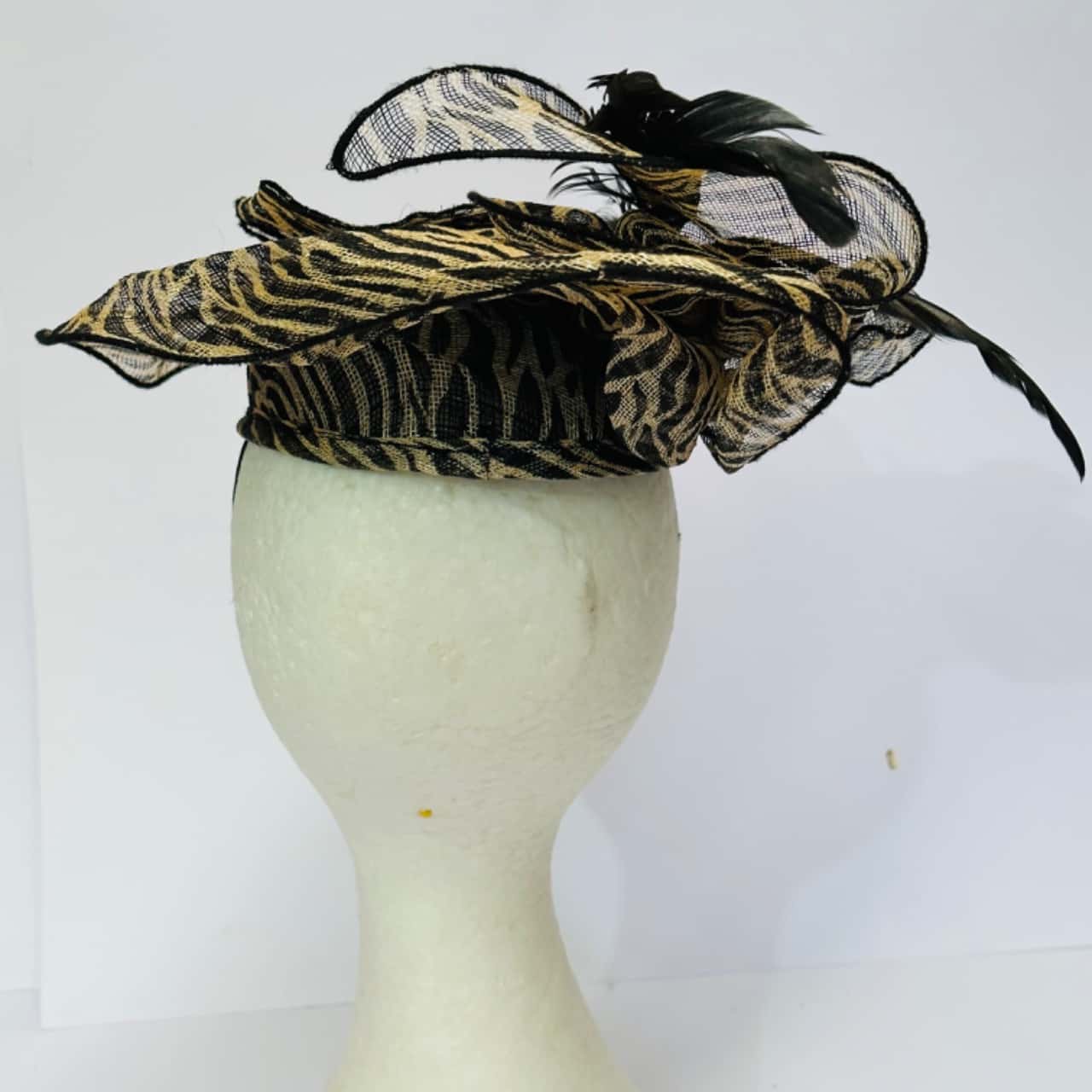 Oval Zebra Print Fascinator with Feather Beige