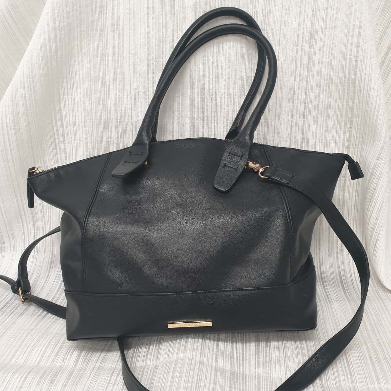 Tony Bianco Classy & Timeless Black Leather Handbag with Gold Tone Hear ...