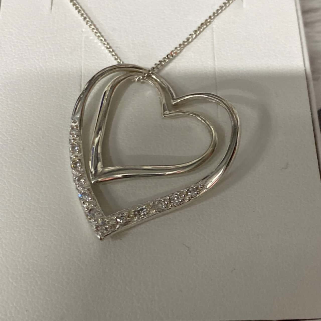 Sterling silver chain and 2 heart pendants (s)