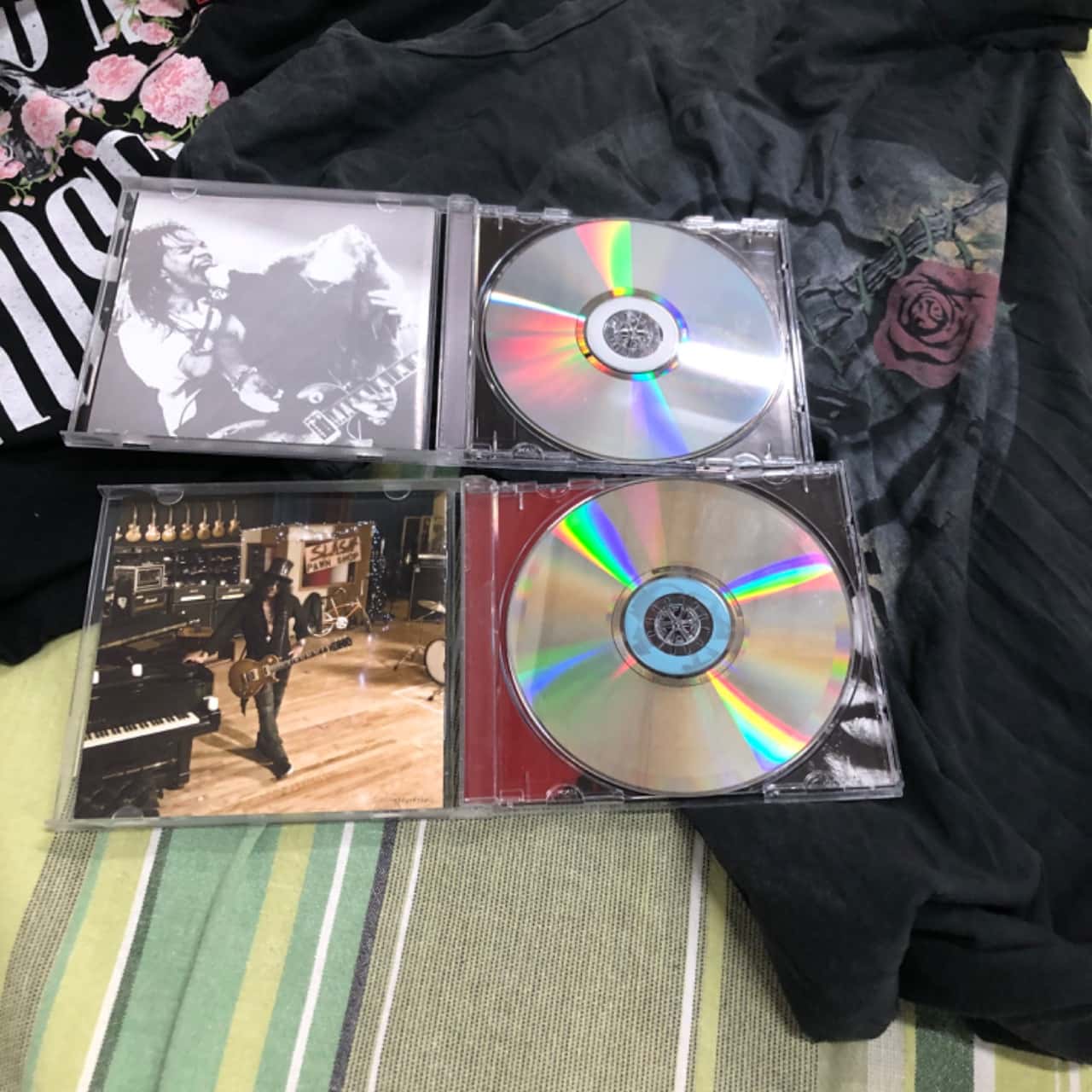 Guns N’Roses Books X 2, CD’s X2 and T-shirts X 2(s)