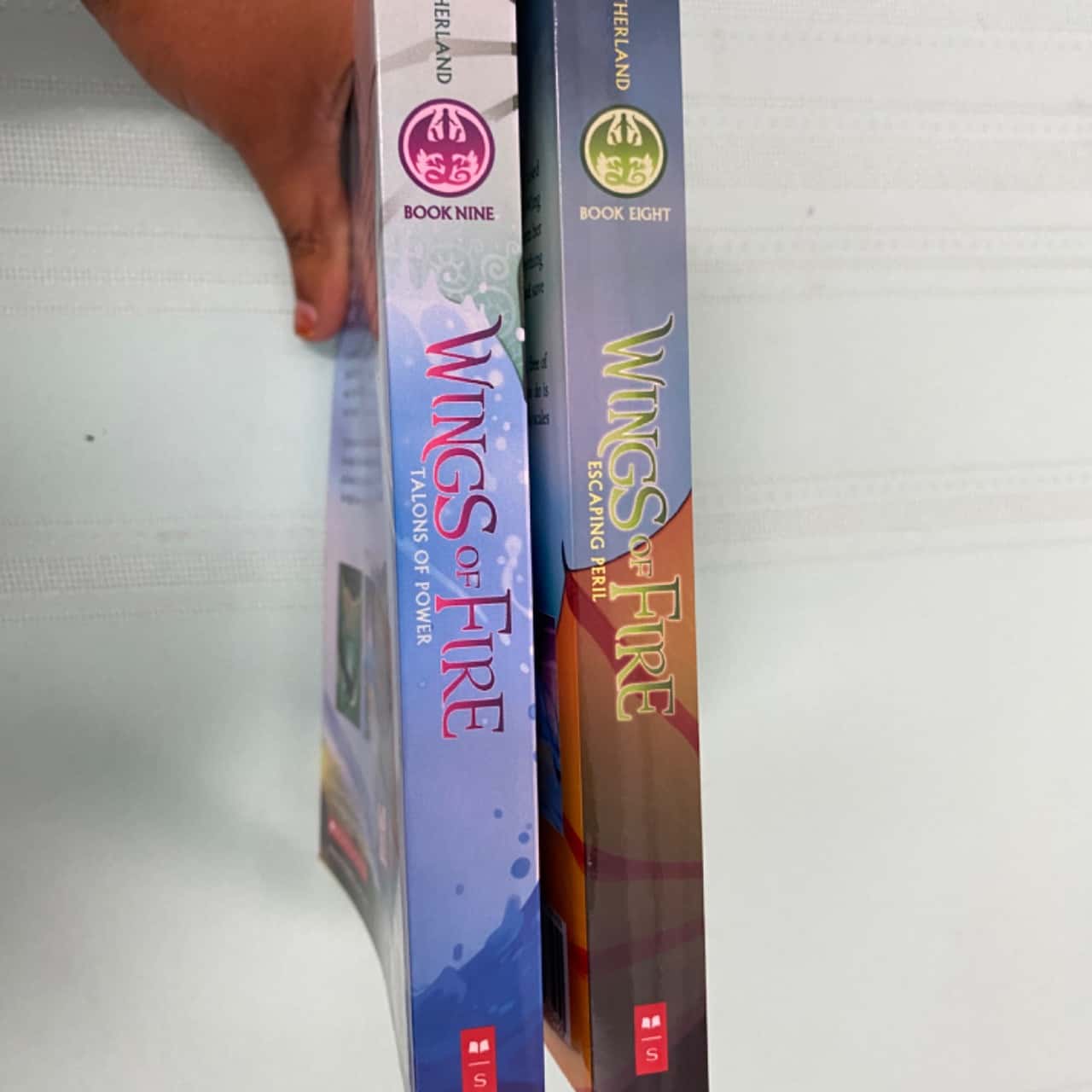 Wings of fire Escaping Peril book 8& Talons of power book 9