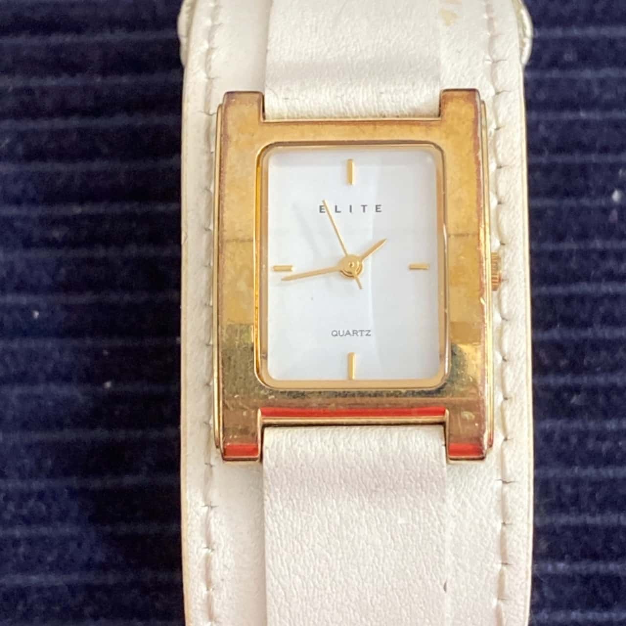 Elite gold and white watch