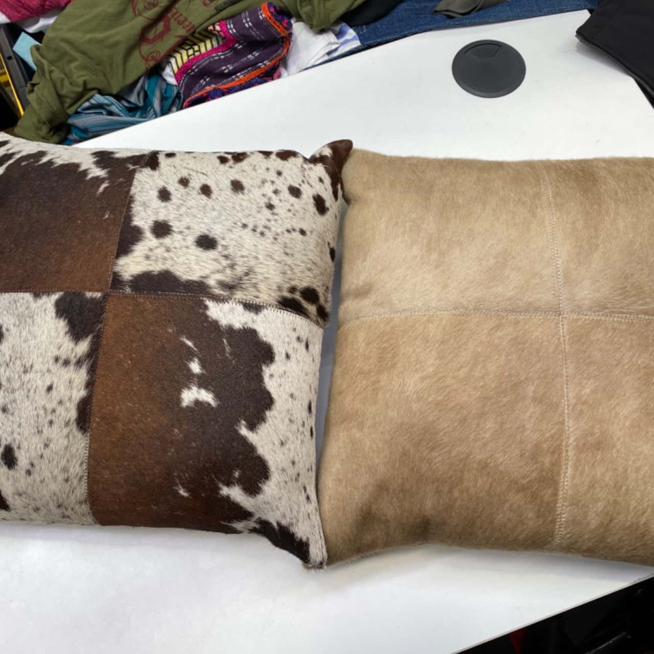 2 x Raw cow hide cushions. (s)