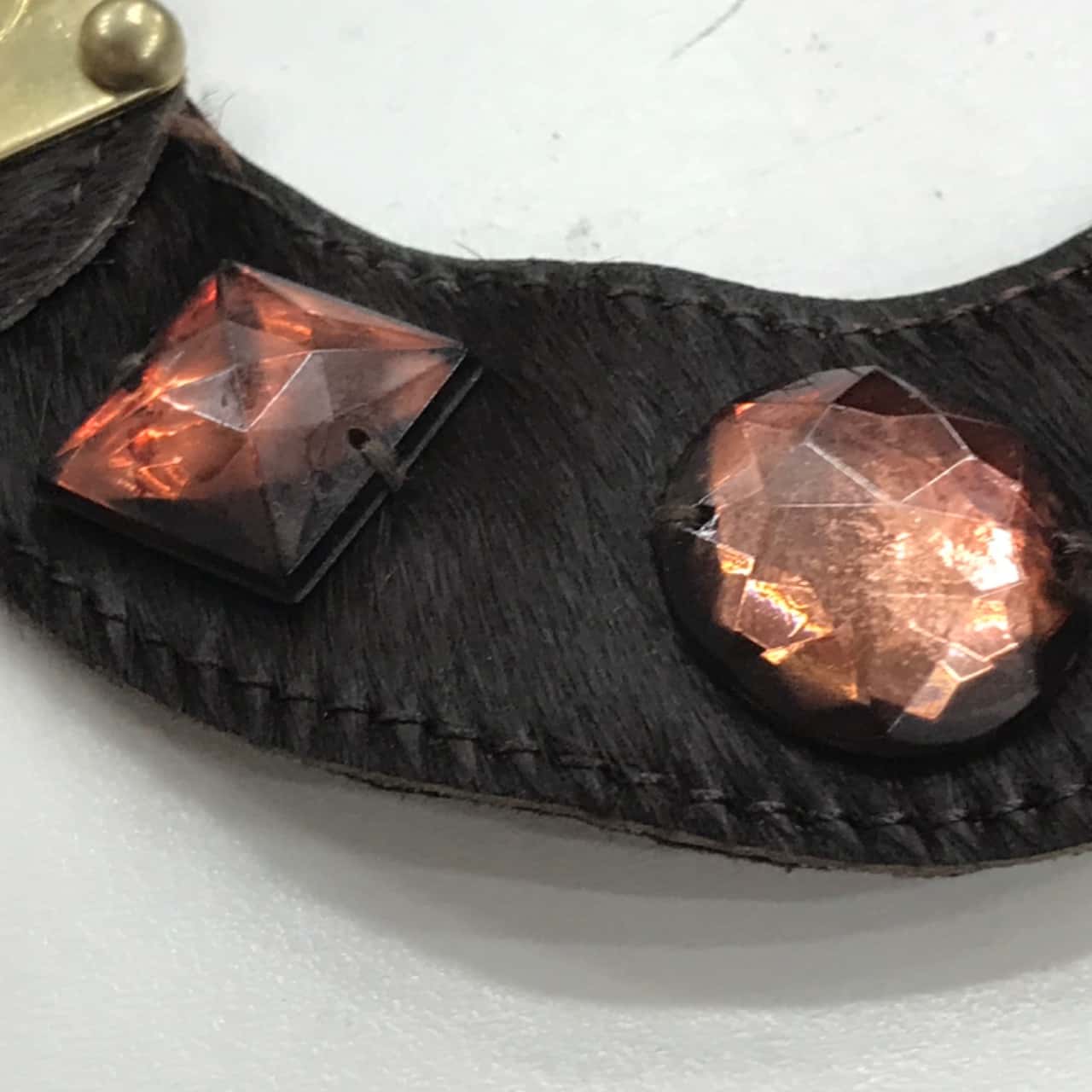 Animal fur leather necklace with brass detail