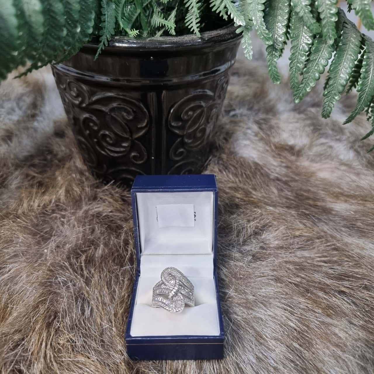 Large Sterling Silver Ring With Baguette Shaped Clear Set Stones(s)