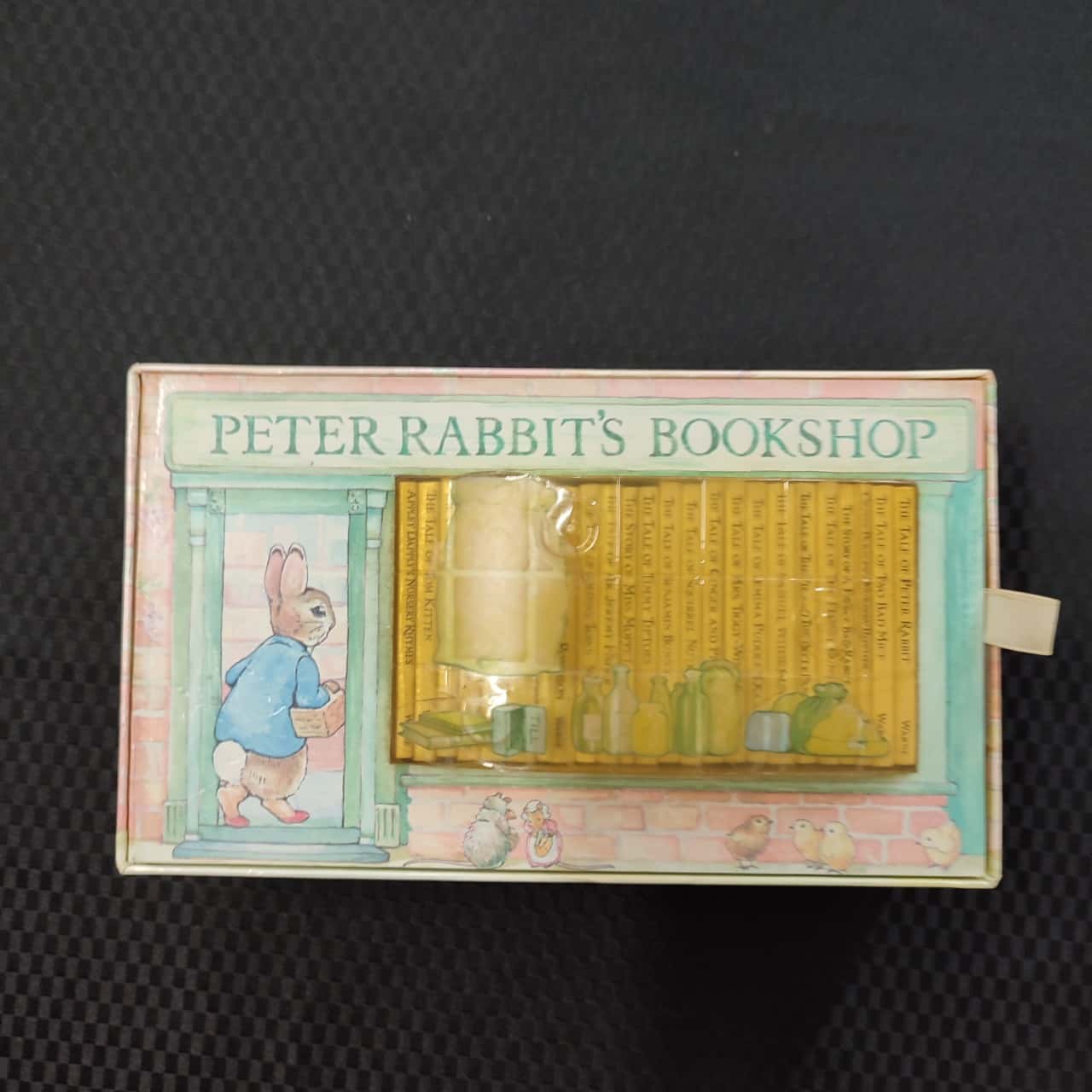 PETER RABBITS BOOKSHOP, set of 23 Miniature Beatrix Potter Books.(s)