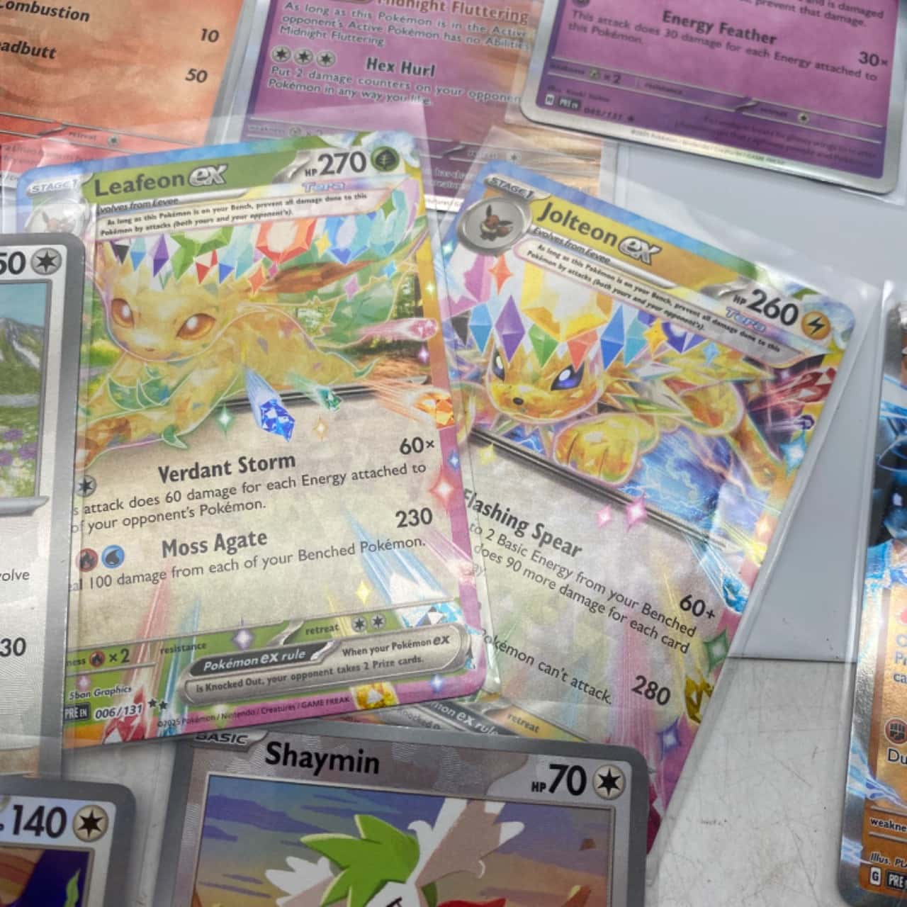 Opened Pokémon Prismatic Evolutions Pokémon Center Elite Trainer Box ...