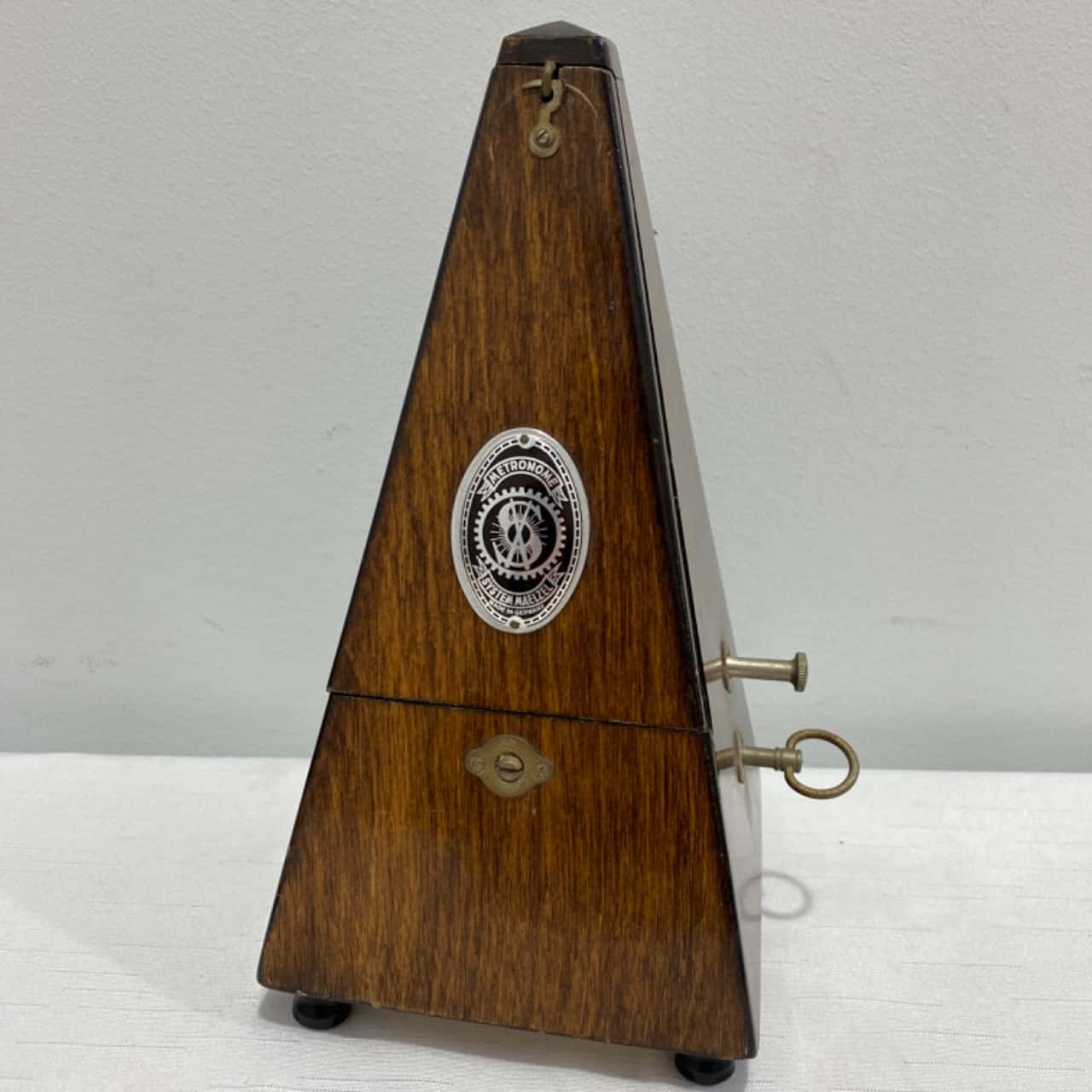 German Made “System Maelzel” Metronome Size: 22.cm Hight Walnut Grain(s)