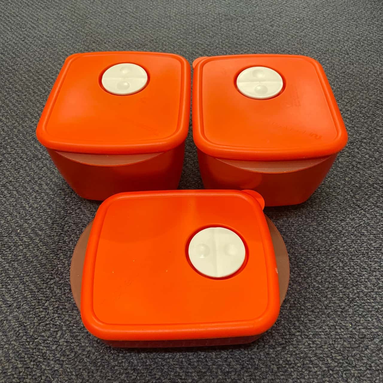 Tupperware: 3 rectangular food storage. Red(s)
