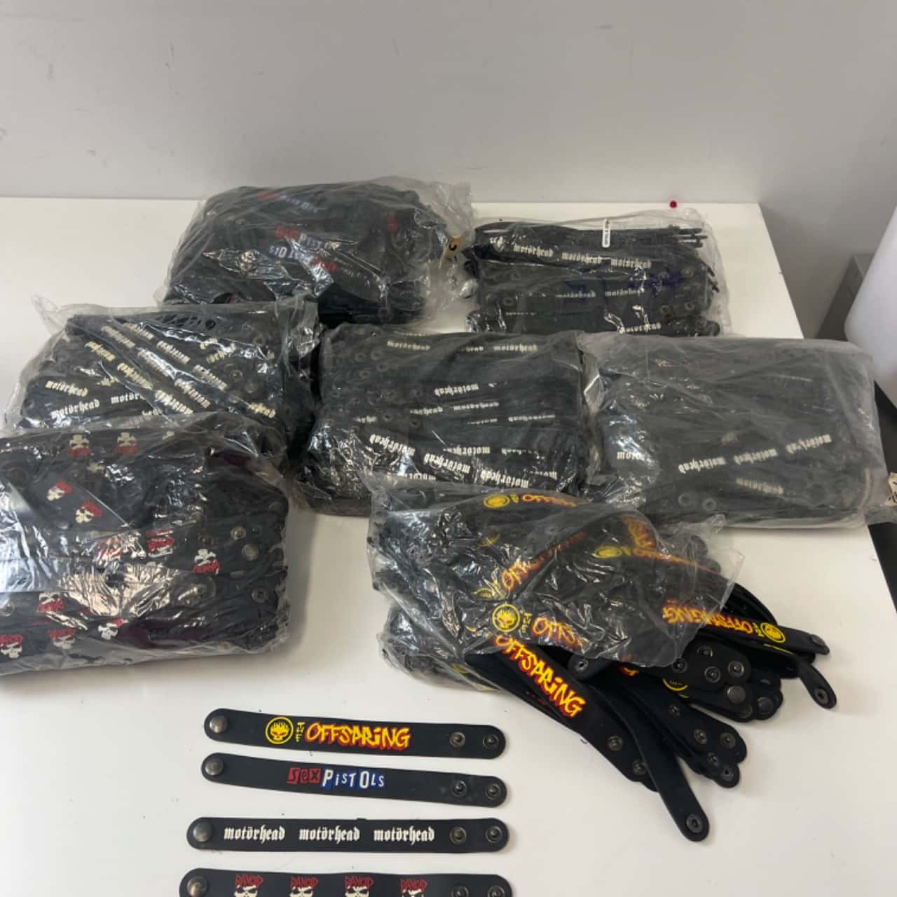 Bulk lot of rubber wrist bands 7 packets approx 350