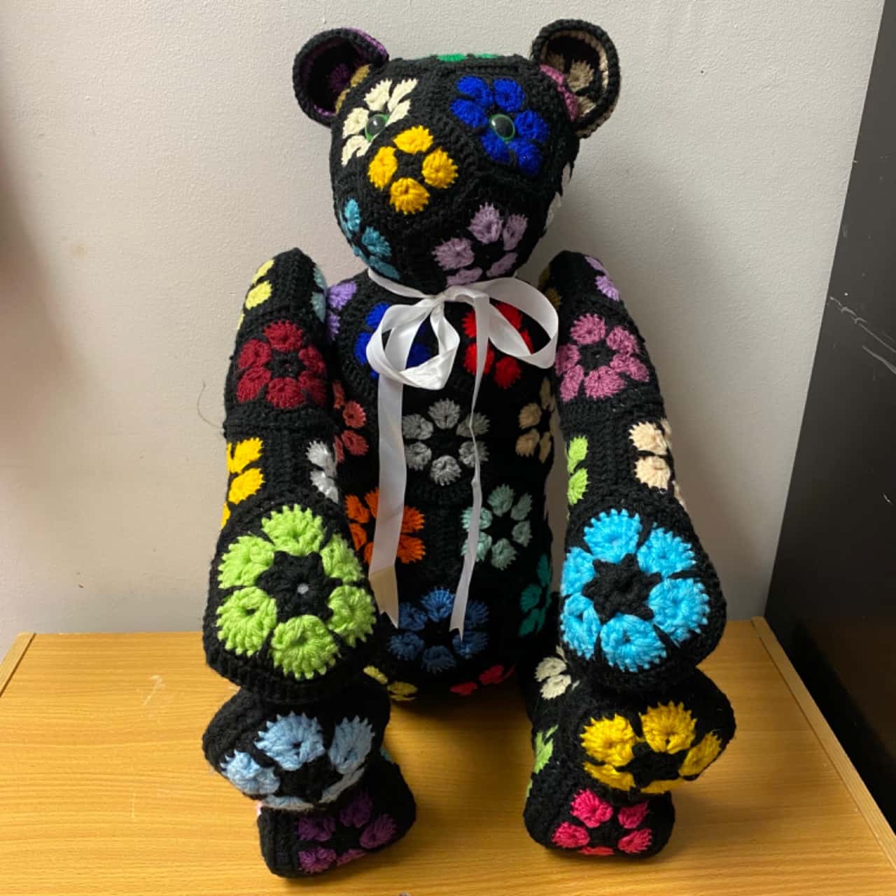 Large Crocheted coloured bear- made in store by volunteer (s)