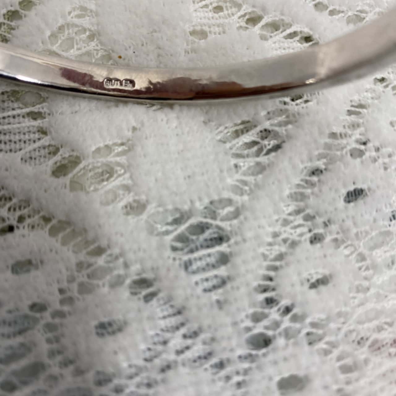 Womens Butler bangle bracelet with a shiny stone (s)