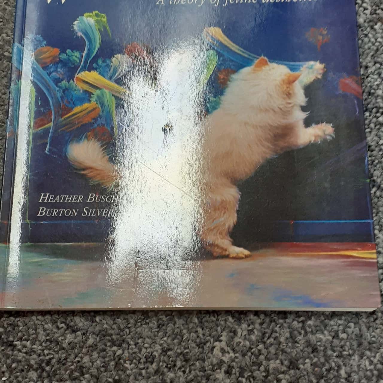 Why Cats Paint - A Theory of Feline Aesthetics