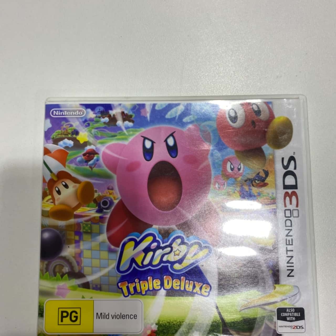 Used Nintendo 2DS & Games