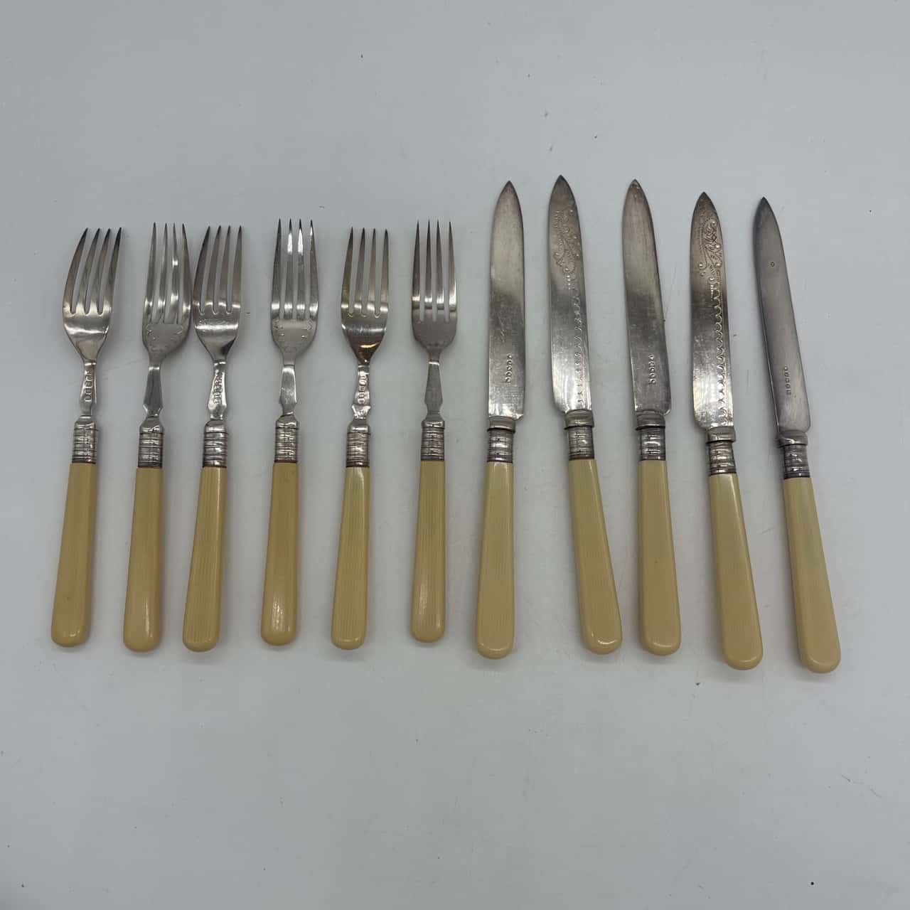 E.P.N.S. 6 forks & 5 knives [B#3](s)