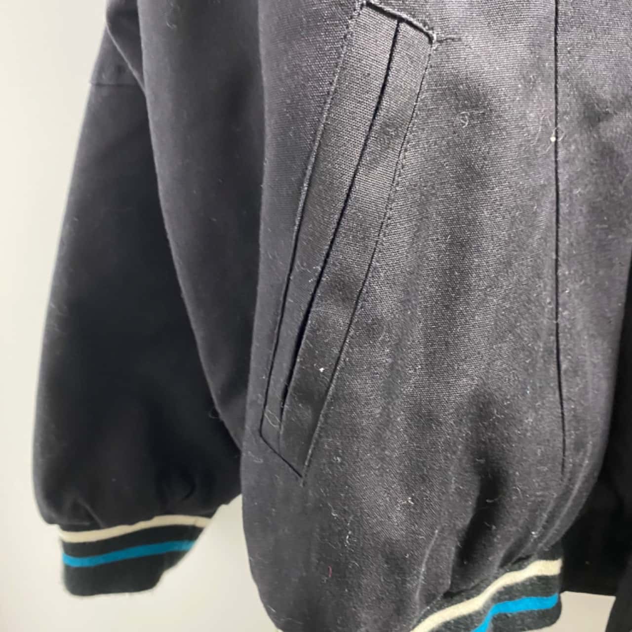 AFL - Port Adelaide. Unisex. Size M Black Vintage Padded Bomber Jacket ...