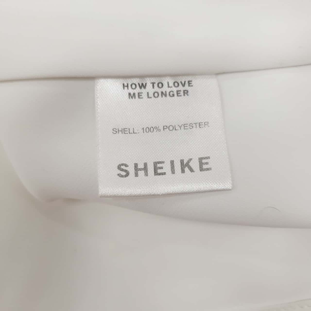 Sheike Womens Size 12 Off-White Sleeveless V-Neck Blouse (As New)