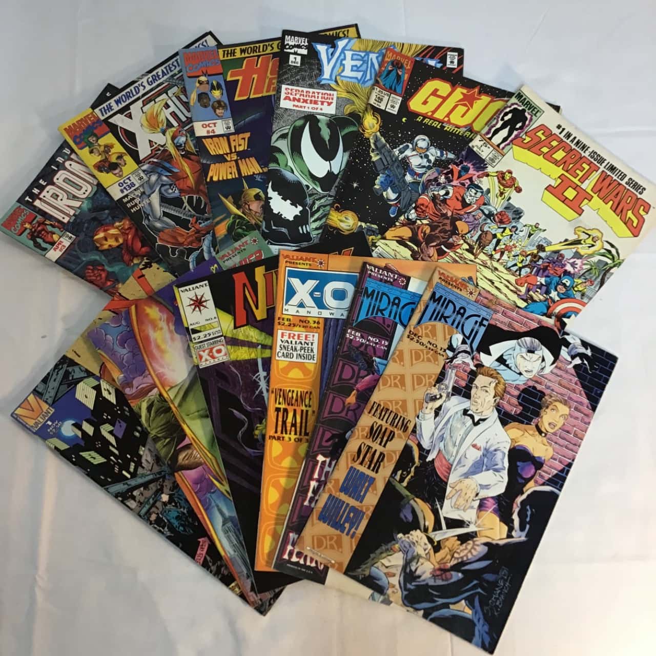 12 Assorted Valiant & Marvel Comics(s)