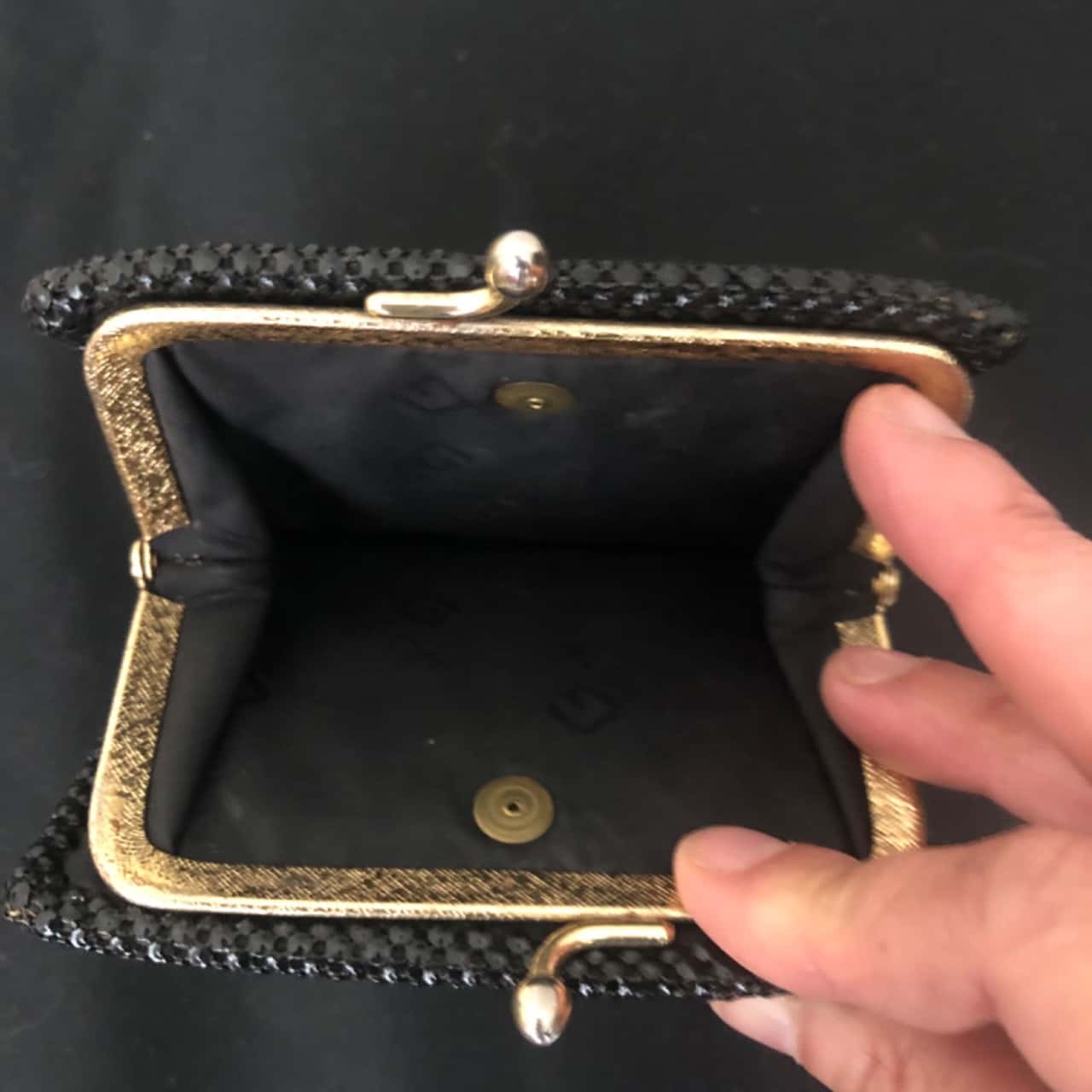 Black glomesh style purse with gold colour clasp(s)