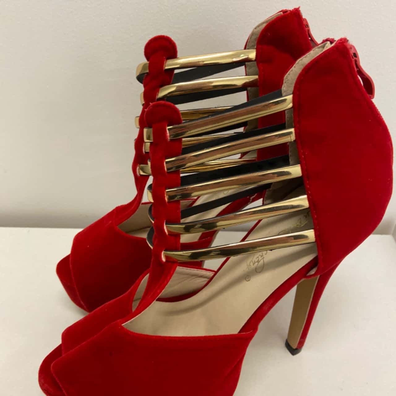 Brand new Size 38 Gold / Red heels