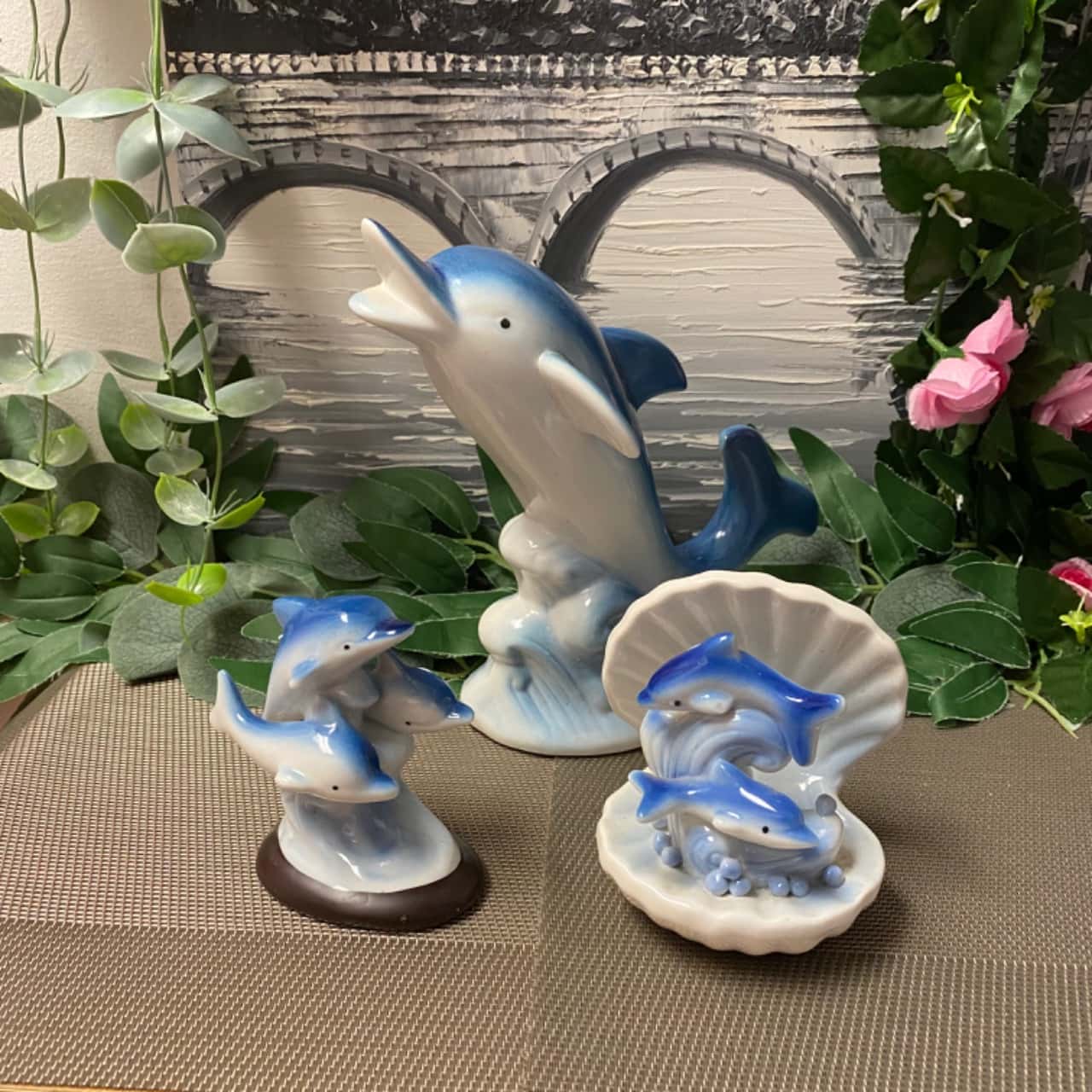 Set of 3 ceramic dolphin statues