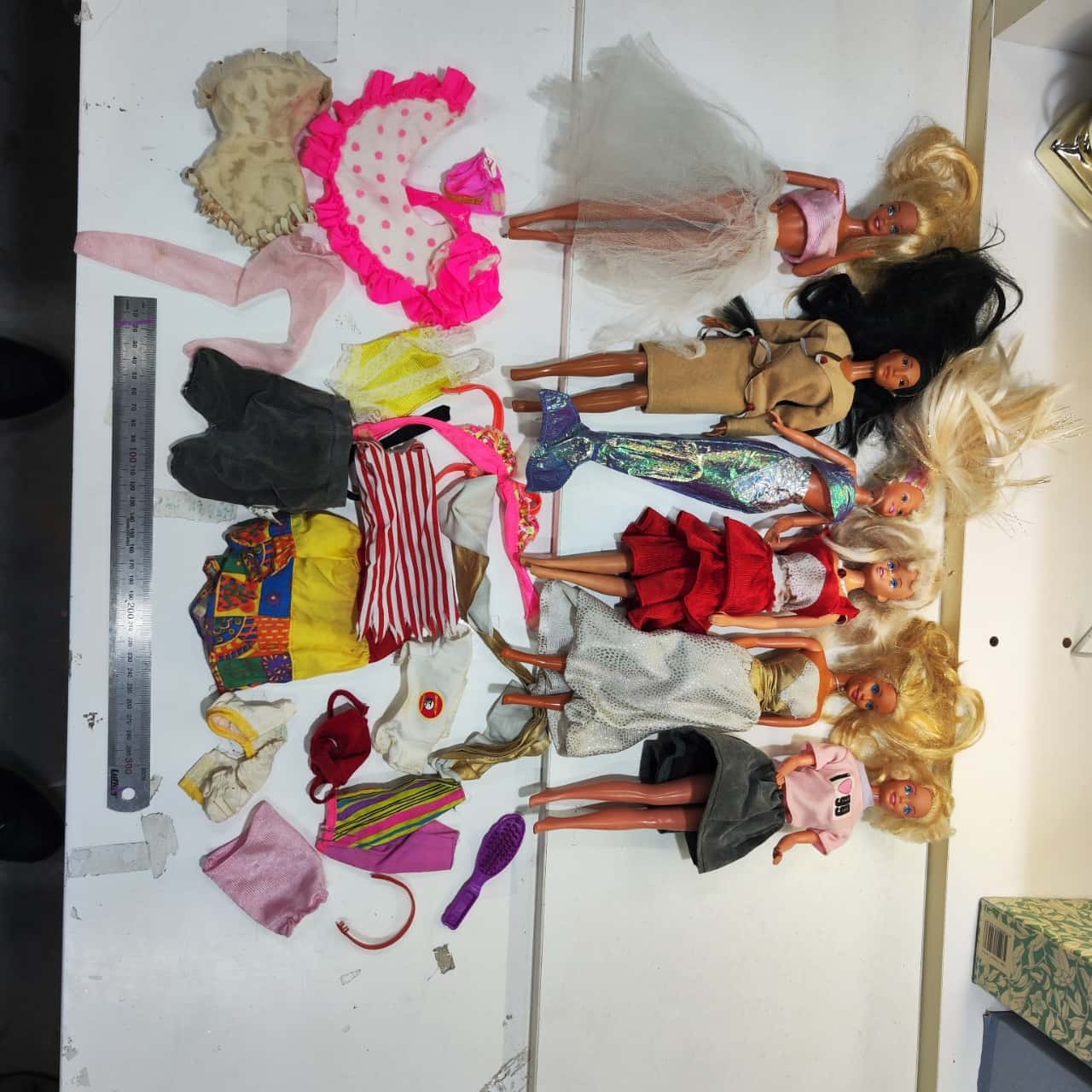 6 Barbies and Some Barbie Clothing As Is Used