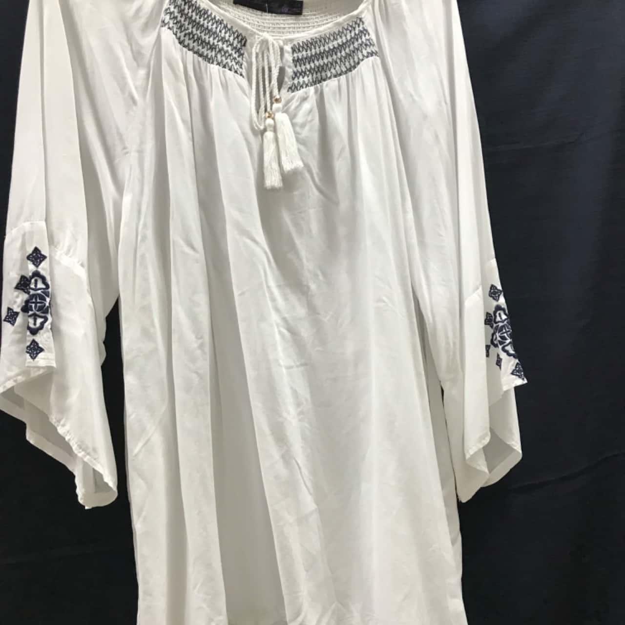 White flowy beach top(s)