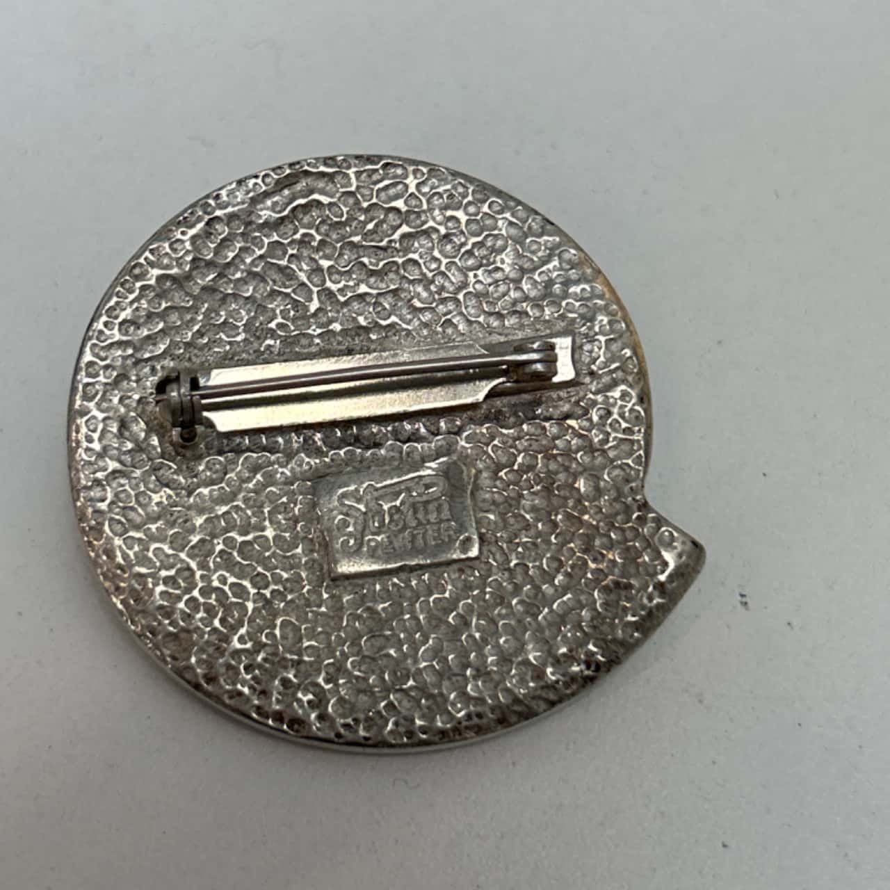 St Justin Pewter broach (s)