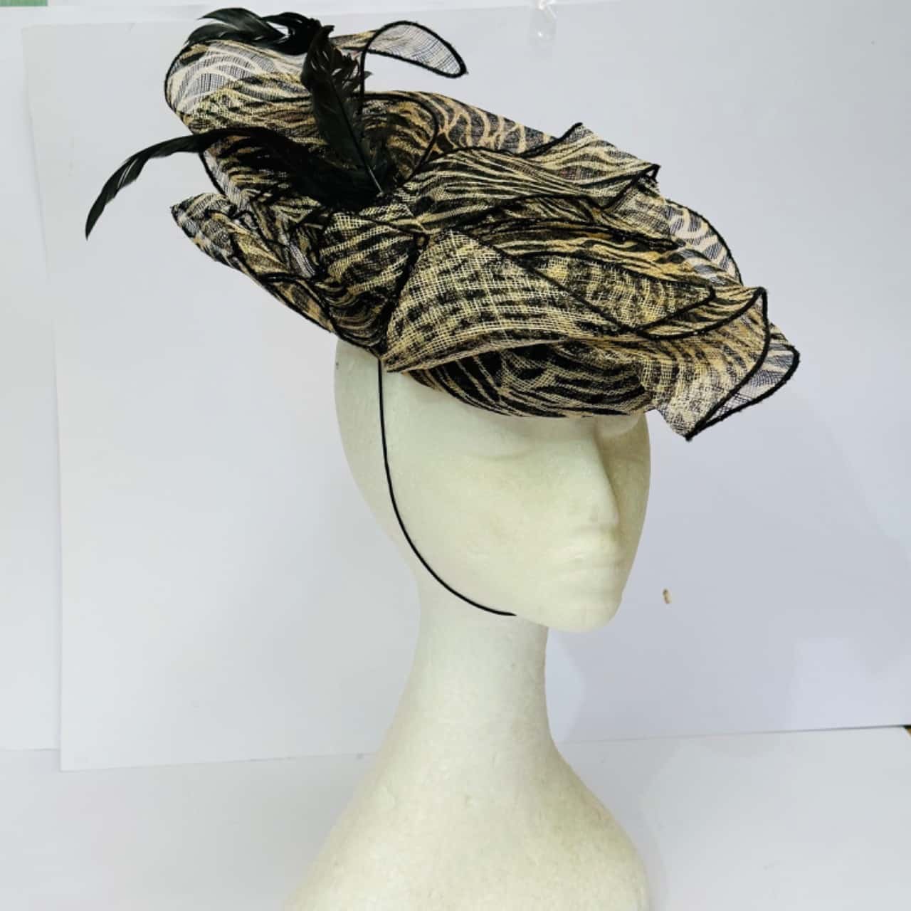 Oval Zebra Print Fascinator with Feather Beige