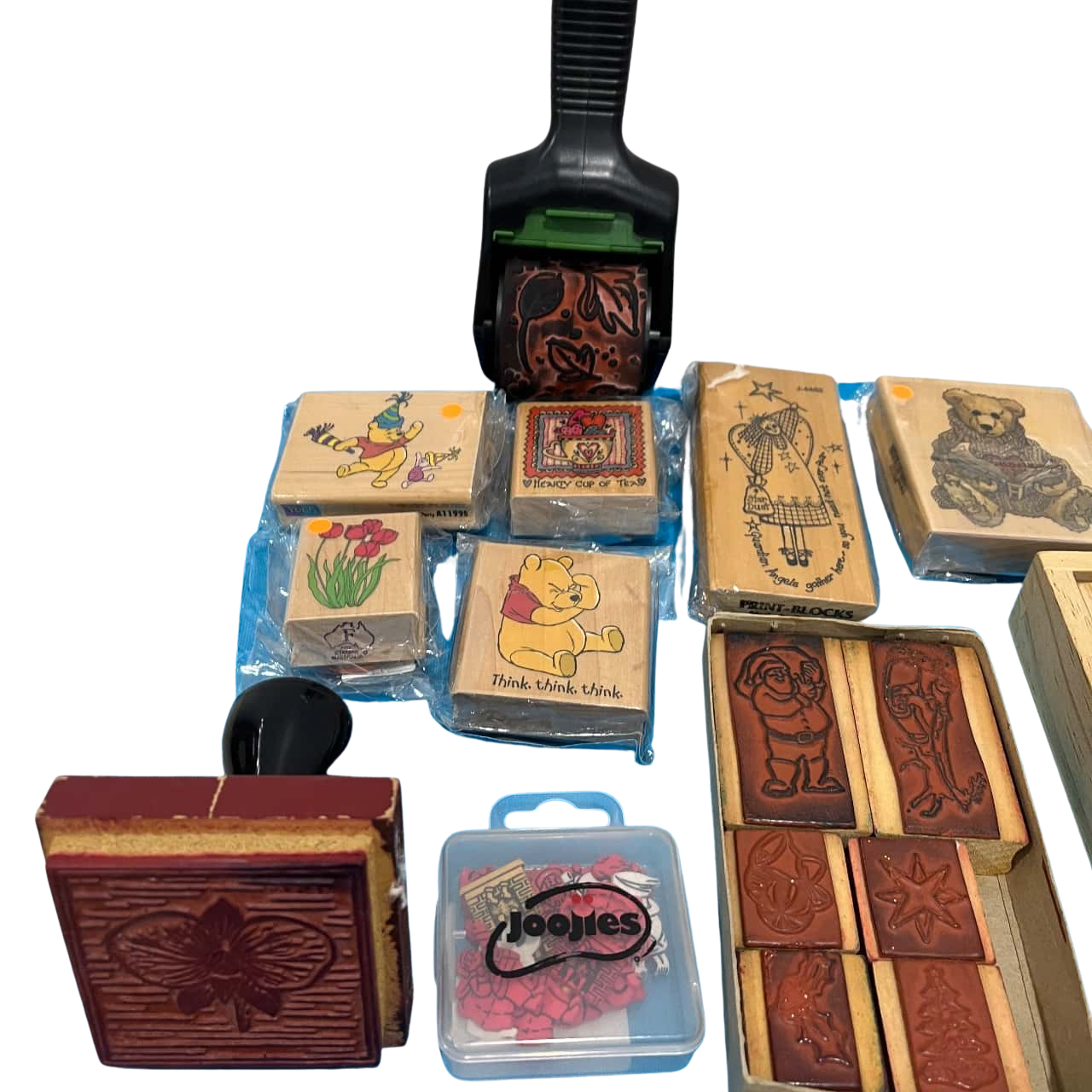 Various Array of Rubber/ Wooden Block Stamps & a hand roller stamp (s)