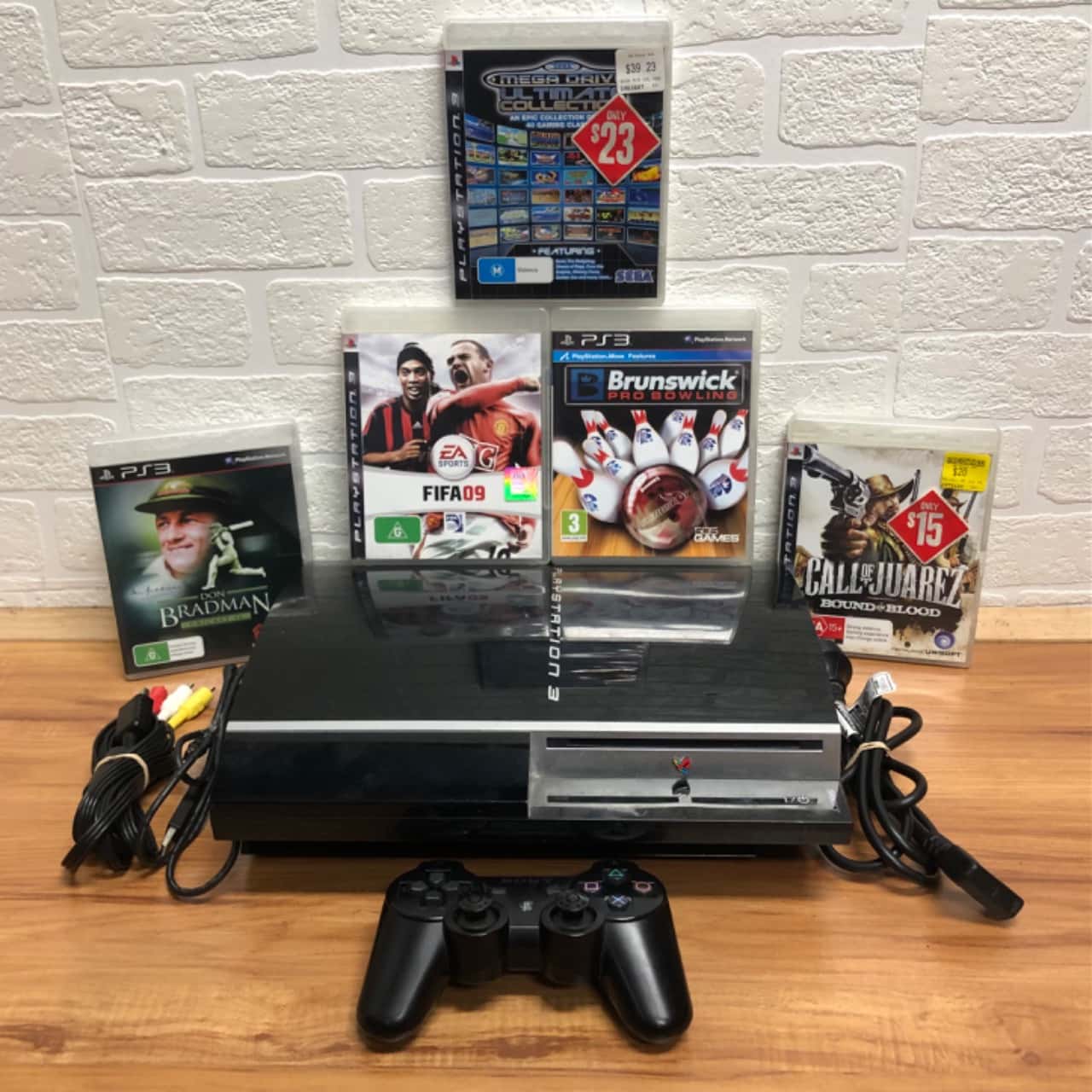 Play Station 3 Console + 5 Assorted Game Bundle(s)