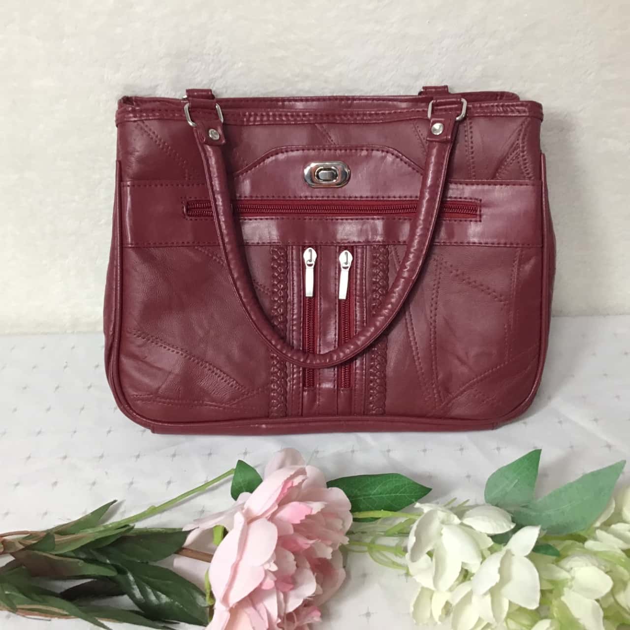 Womens Maroon Textured Handbag (s)
