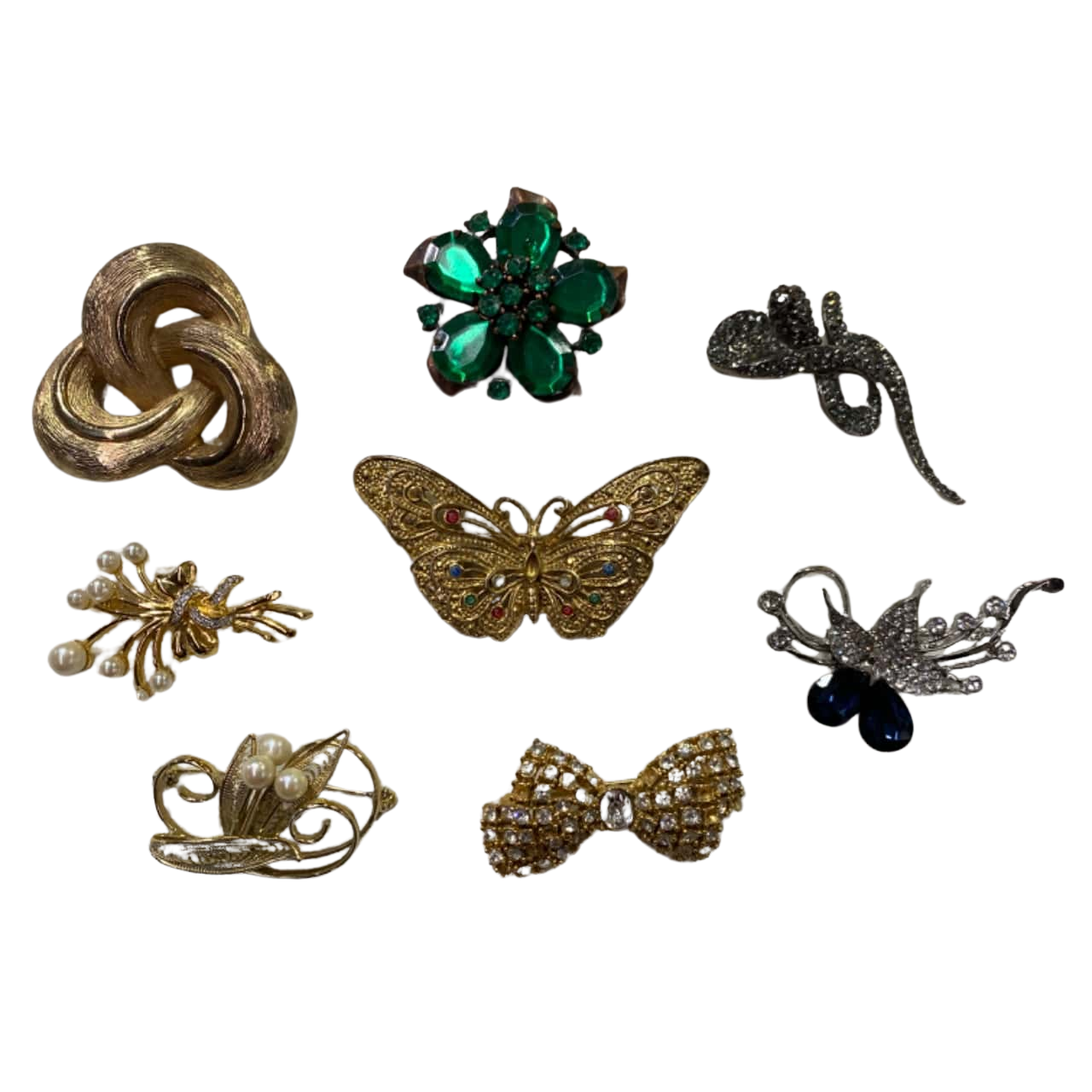 8 Women’s Statement Brooches(s)