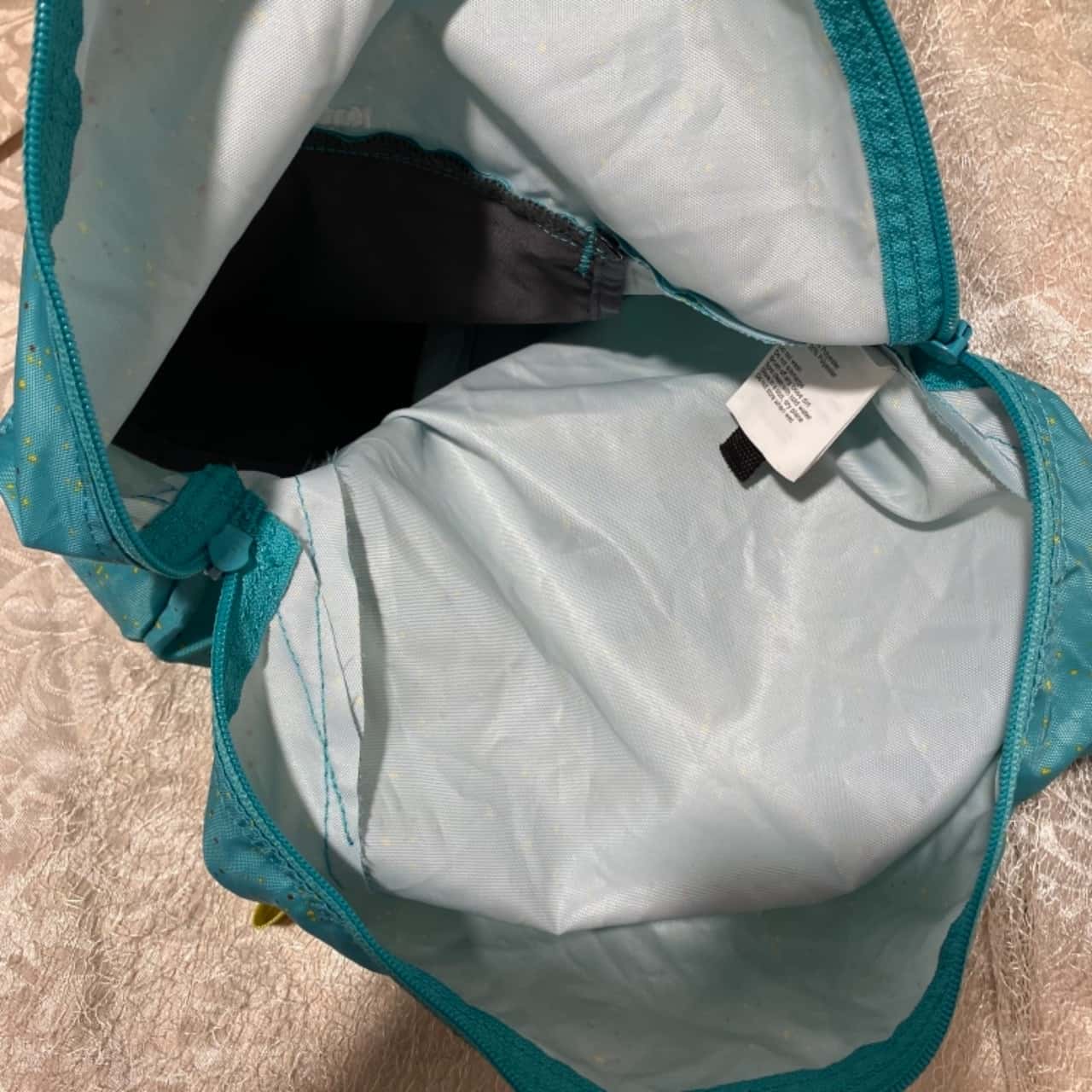 Kathmandu raincoat Backpack Teal (s)