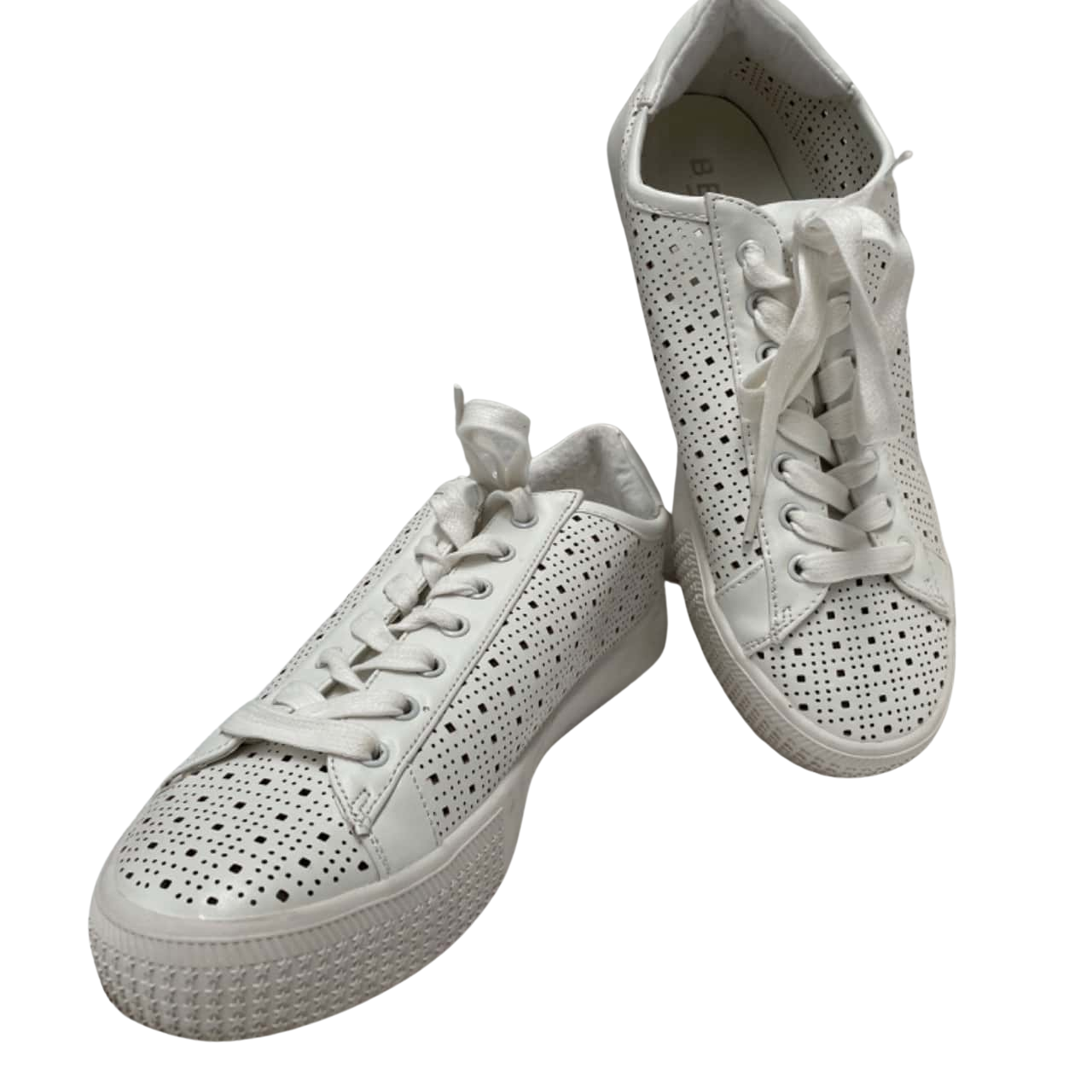 Betts Ladies Sneakers. White with small square holes. Size 9.