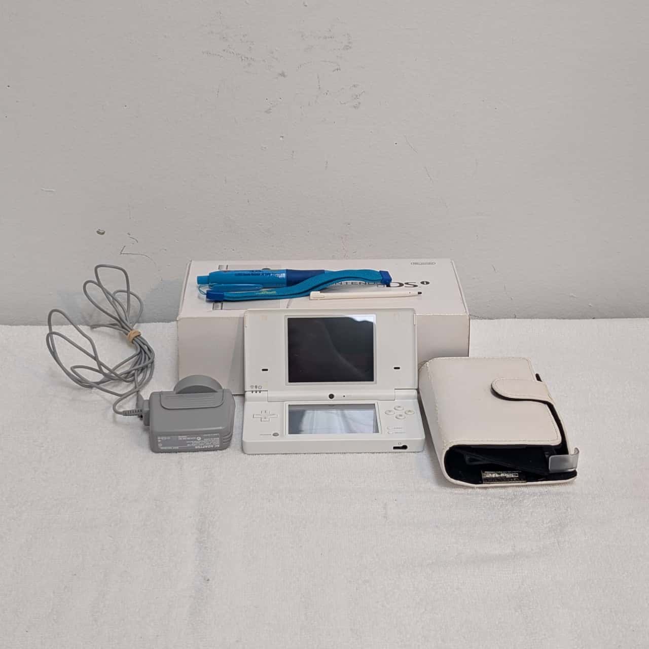 Nintendo DSi (White) with charger and accessories(s)