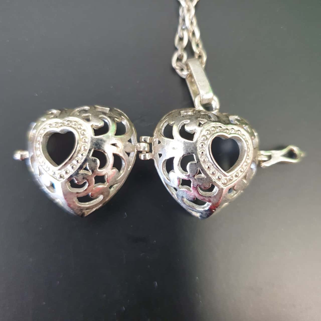 Womens Silver Plate Hollow Cage Locket with Chain. (s)