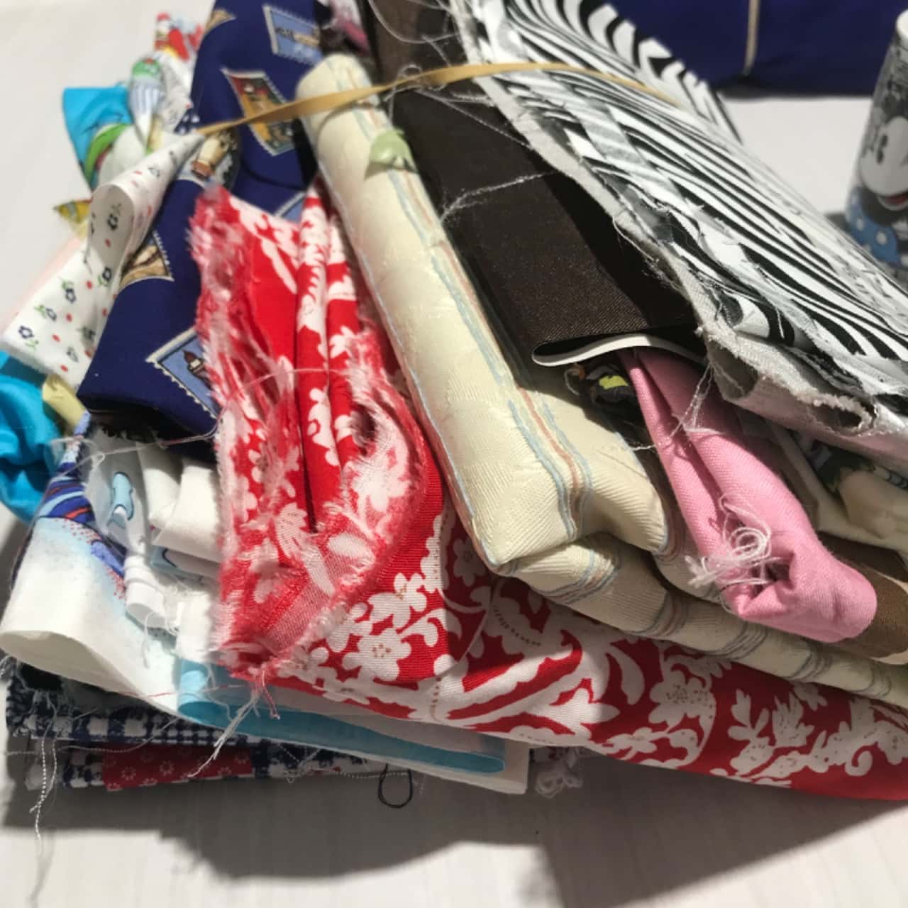 Assorted Fabrics/Different Sizes and Colours suitable for Patchwork