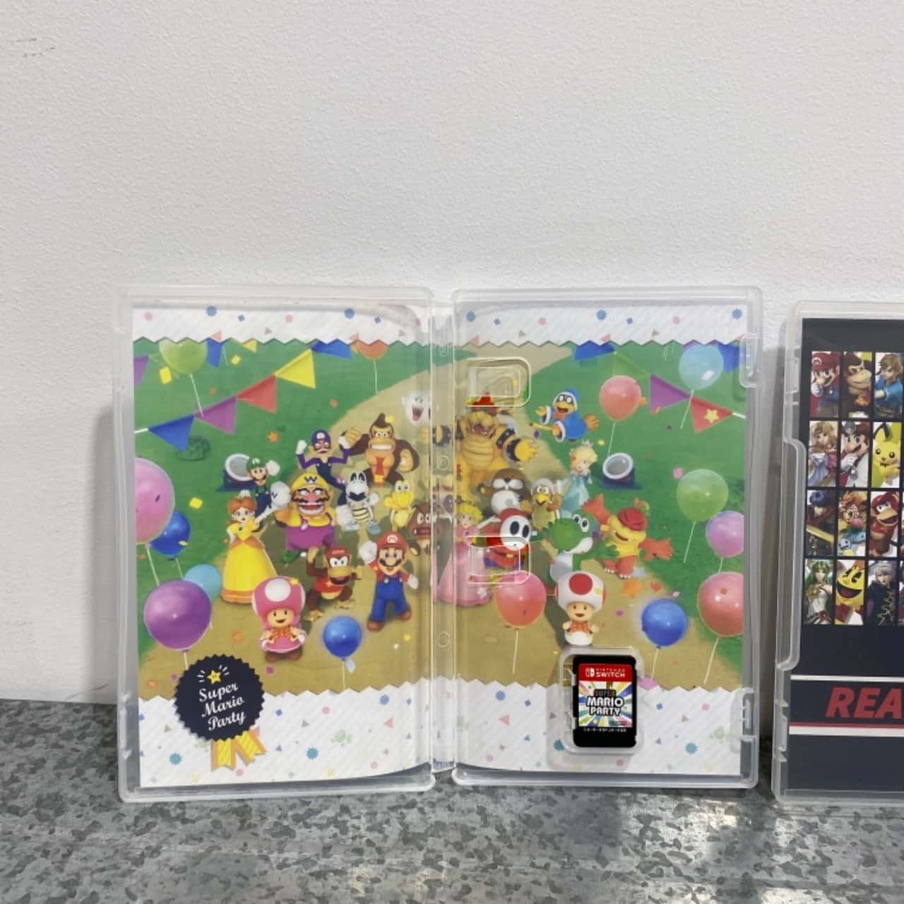 Nintendo switch super Mario party and Super smash Bros ultimate