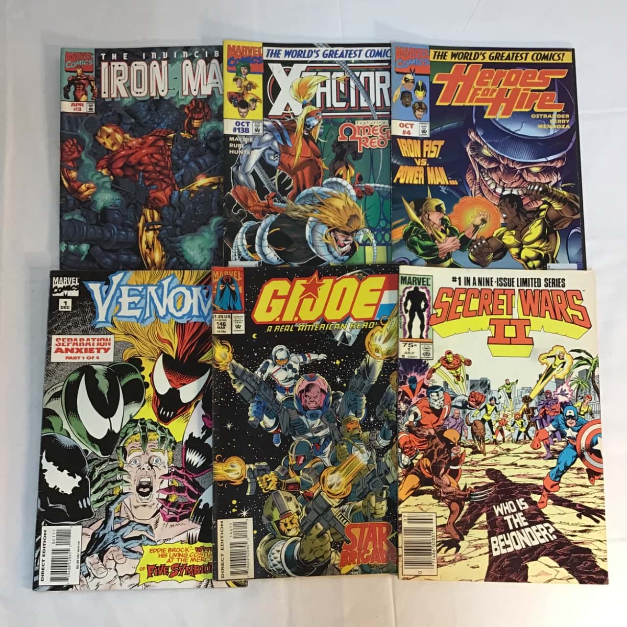 12 Assorted Valiant & Marvel Comics(s)